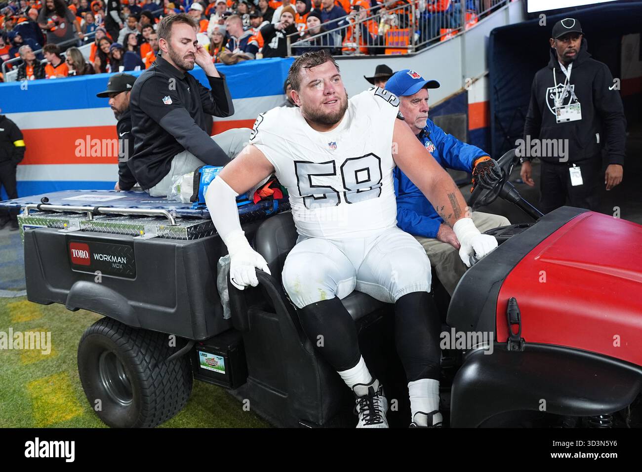 Las Vegas Raiders Jackson Powers-Johnson is taken off on a cart during ...