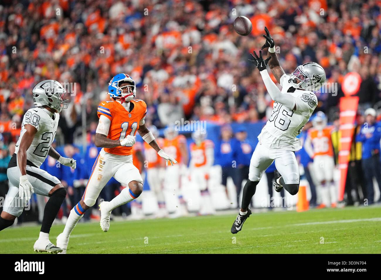 Las Vegas Raiders cornerback Kyu Blu Kelly (36) intercepts a ball ...