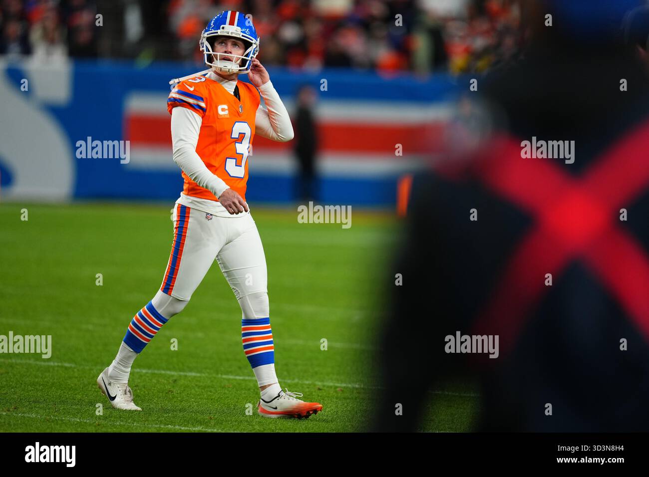Denver Broncos kicker Wil Lutz (3) walks off the field after missing a ...
