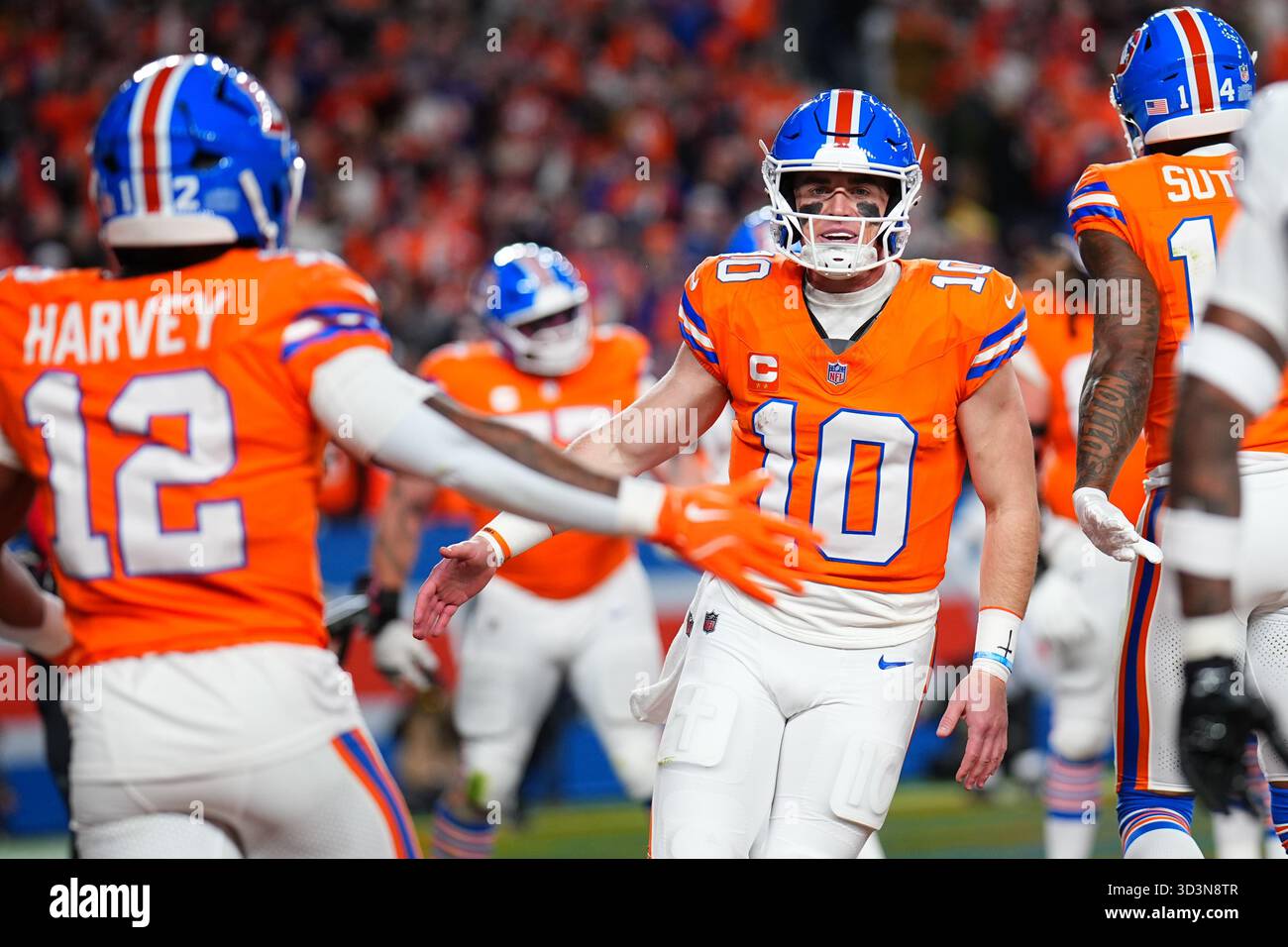 Denver Broncos quarterback Bo Nix (10) celebrates after throwing a ...