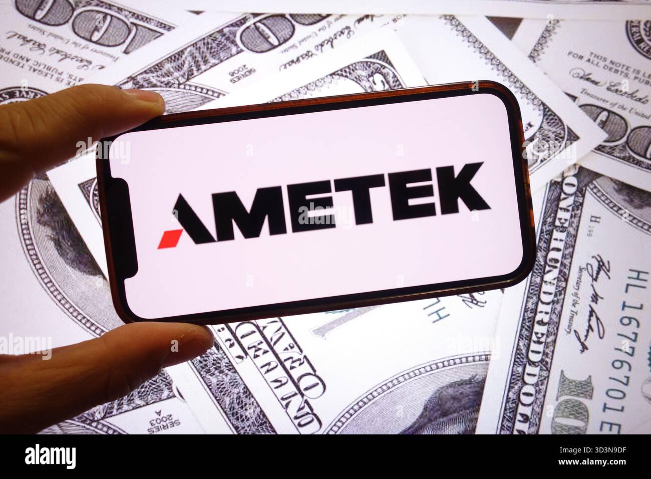 In this photo illustration, the Ametek company logo is seen displayed ...