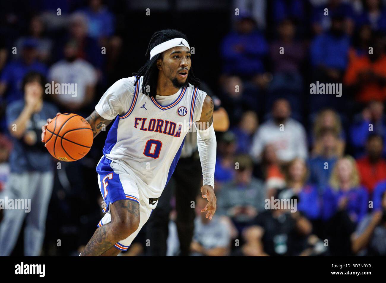 Florida guard Boogie Fland dribbles during the second half of an NCAA ...