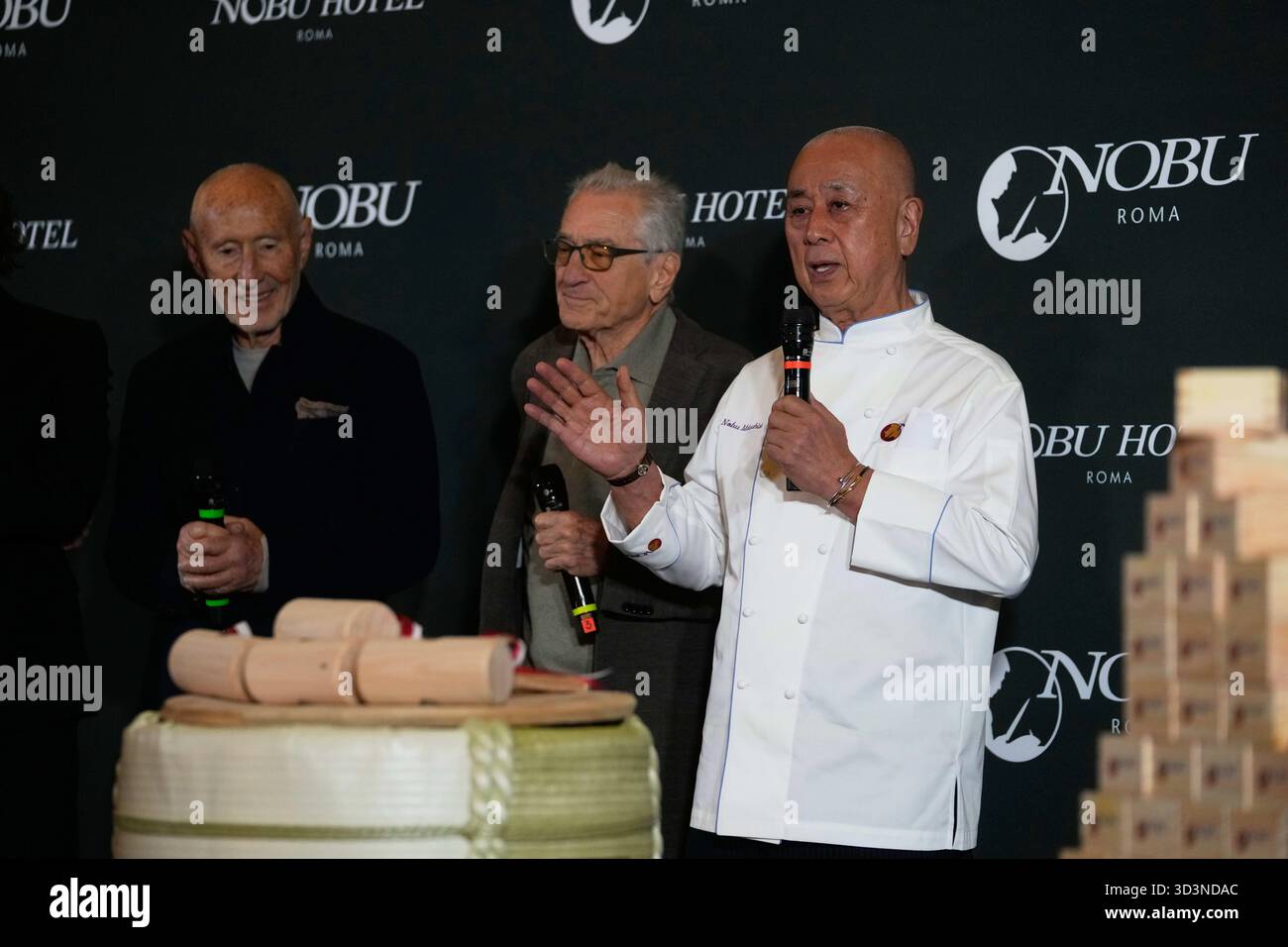 From left, Film producer Meir Teper, Robert De Niro chef Nobu Matsuhisa ...