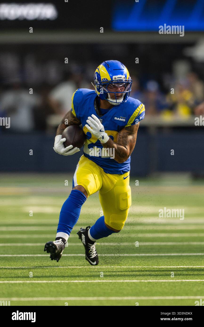 Los Angeles Rams running back Blake Corum (22) runs with the ball ...