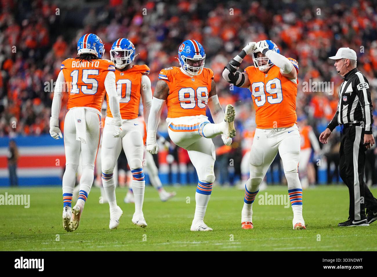 Denver Broncos defensive end John Franklin-Myers (98) and Denver ...