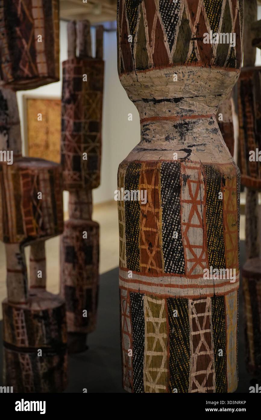 Tiwi Pukumani grave posts. Ornate, carved wooden poles with traditional ...