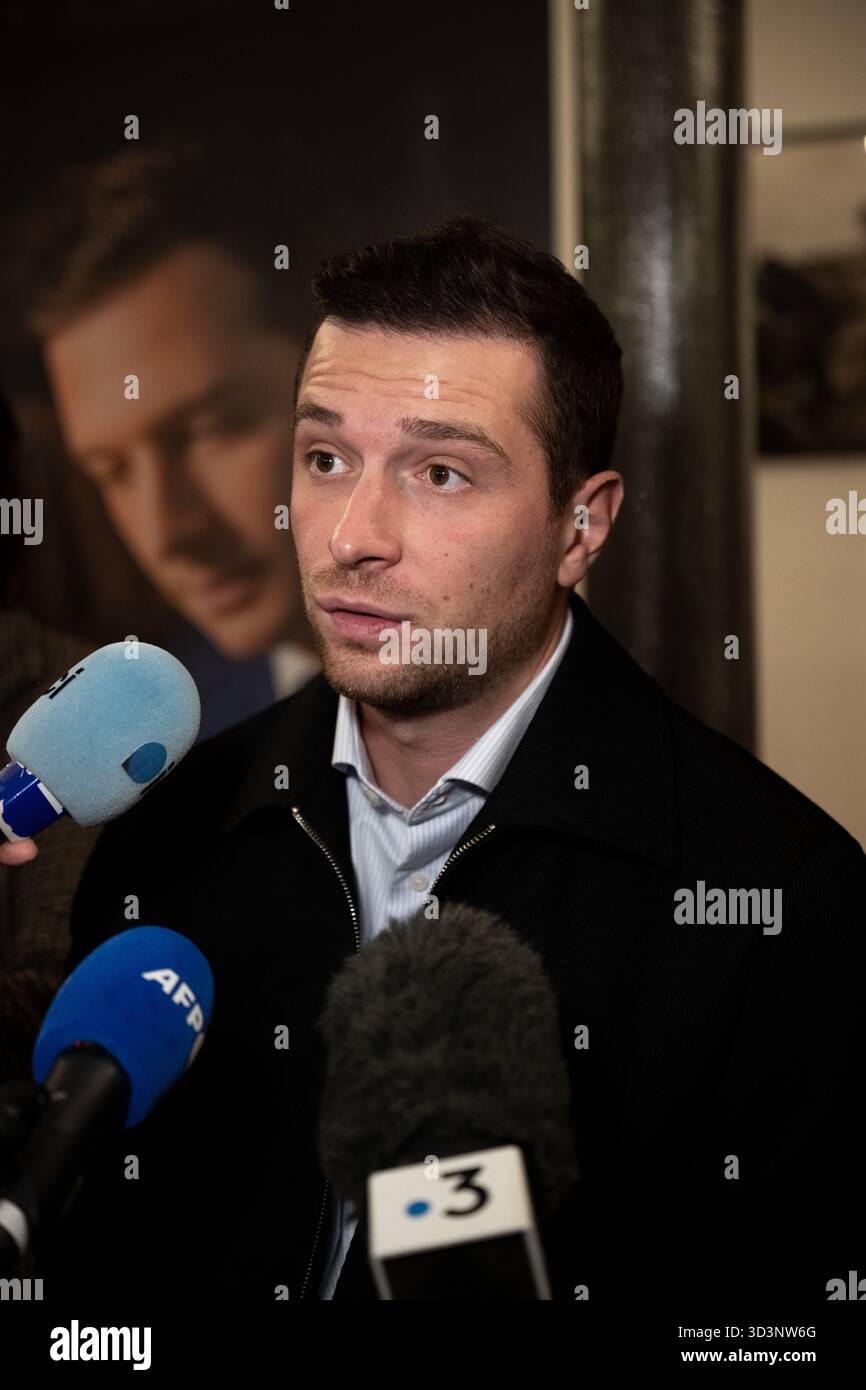 Jordan Bardella answers questions from the press before signing copies ...