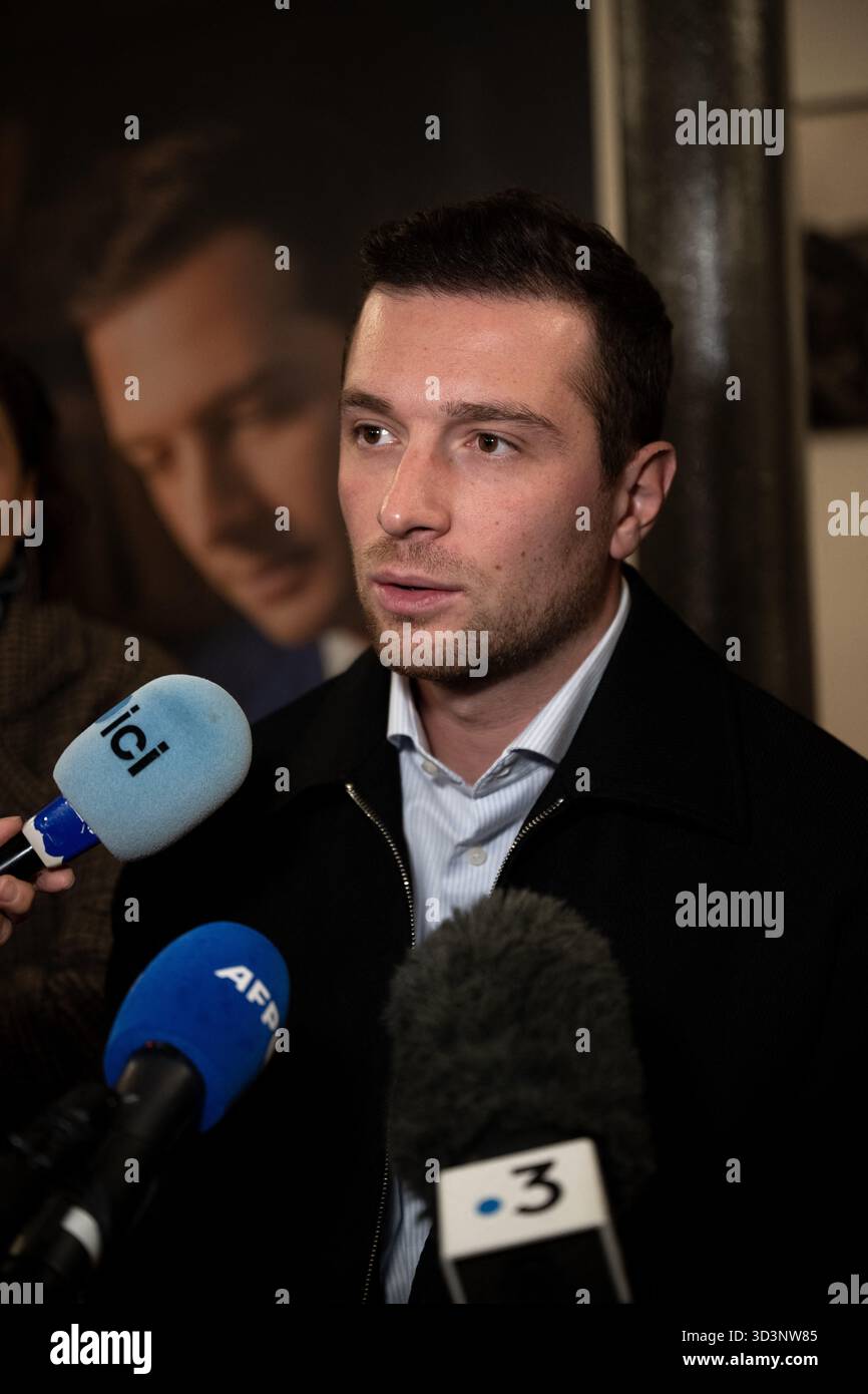 Jordan Bardella answers questions from the press before signing copies ...