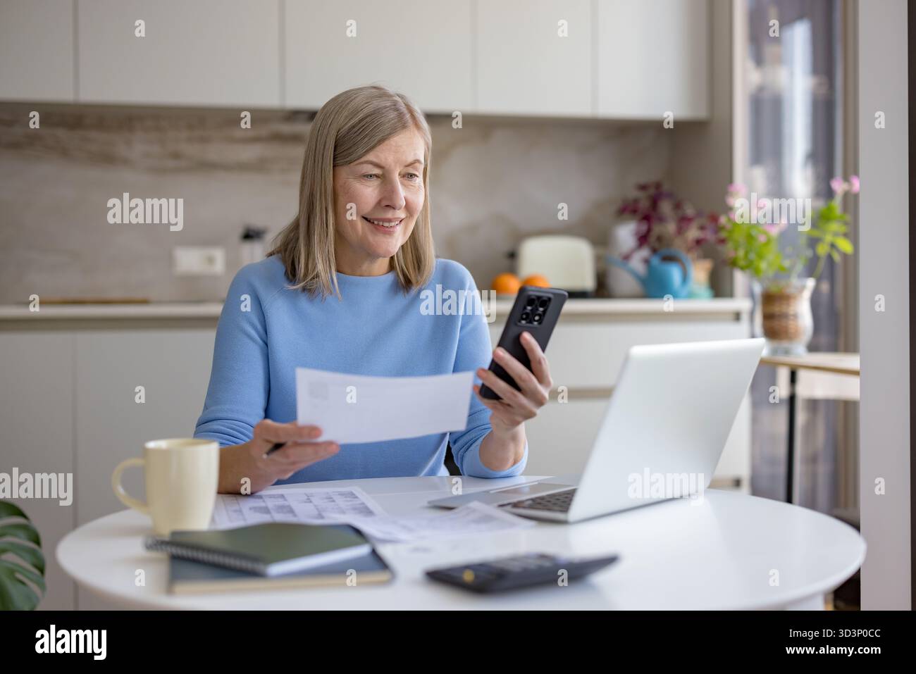 Woman organizing personal finances hi-res stock photography and images ...