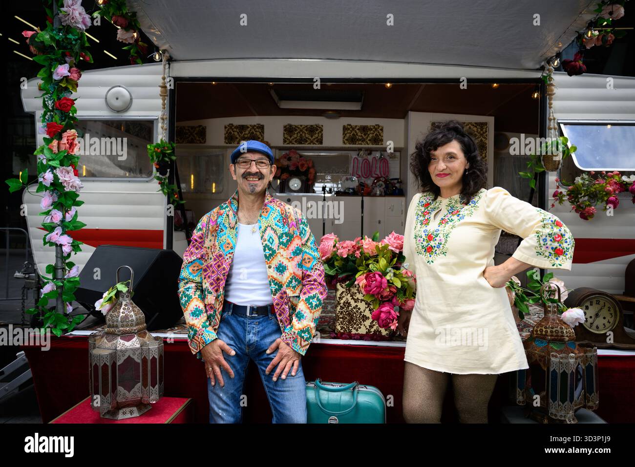 Sarah Bedak (right) and Nenad Radic of Lolo Lovina pose for a ...