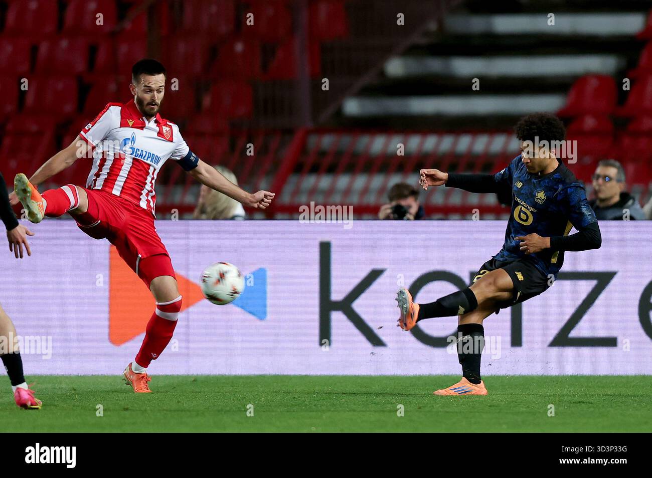 Belgrade, Serbia. 6th Nov, 2025. Lille's Tiago Santos and Mirko Ivanic ...