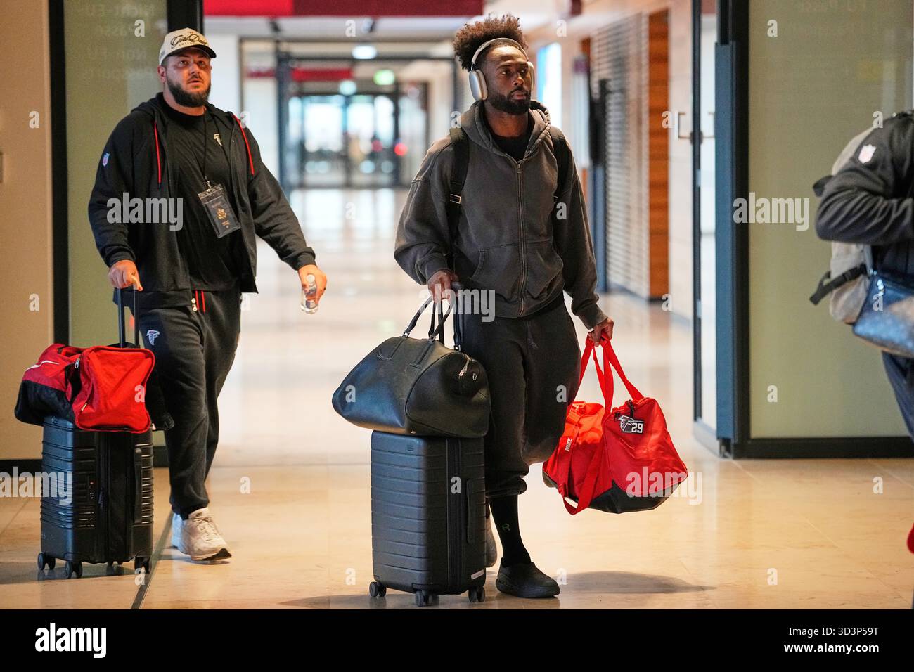 Atlanta Falcons safety Jordan Fuller arrives with teammates at the ...