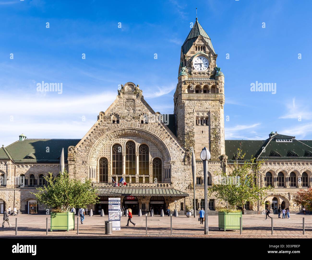 Front view of the clock tower and facade of the departure hall of Metz ...
