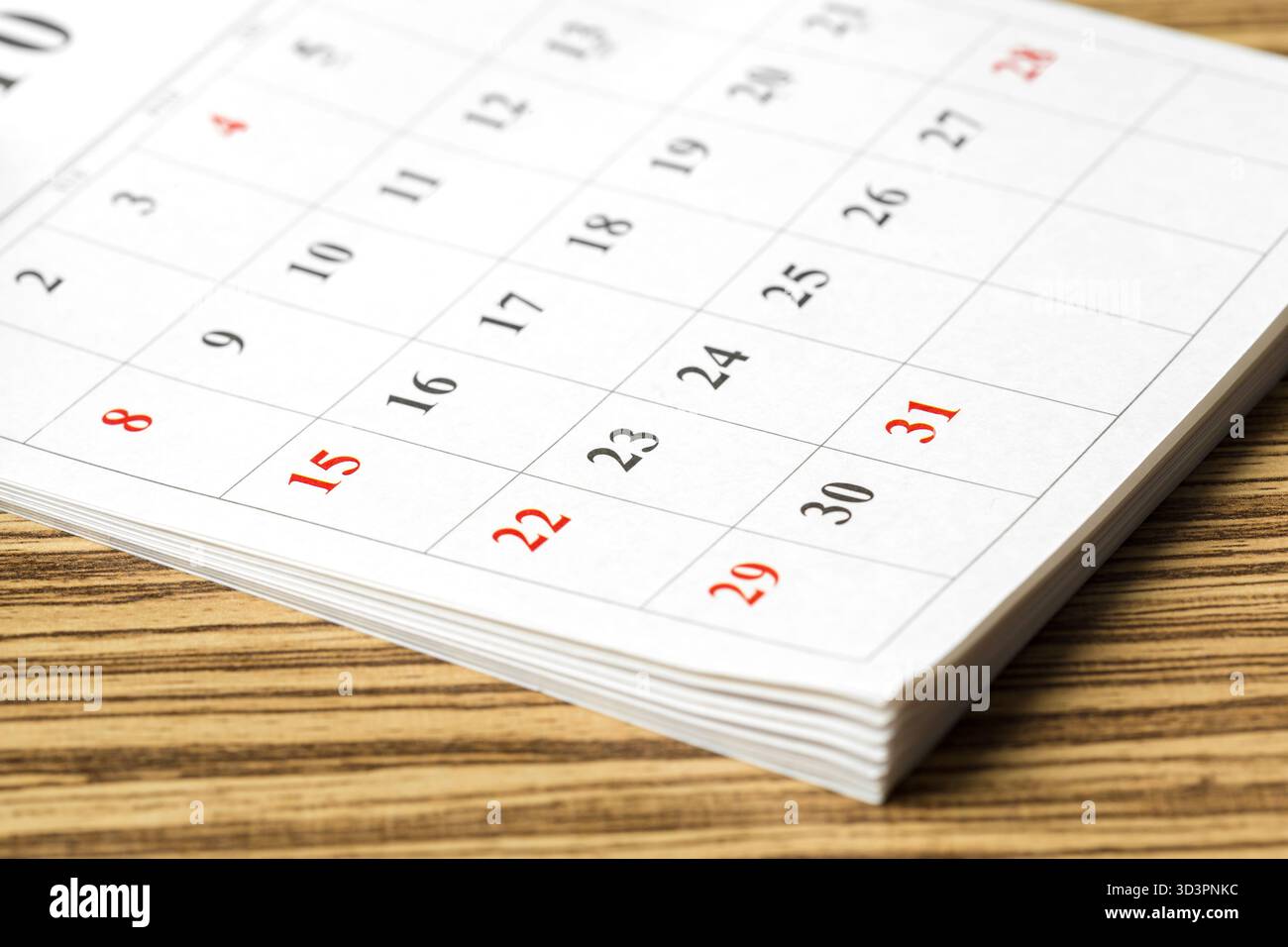 Calendar pages showing days of the month with highlighted date numbers ...