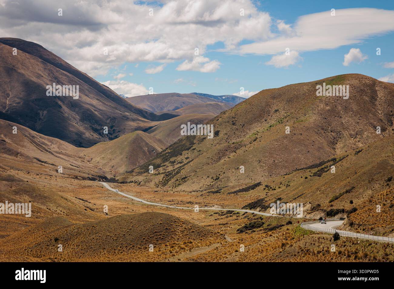 State Highway 8 seen cut through the valleys of the Lindis Stock Photo ...