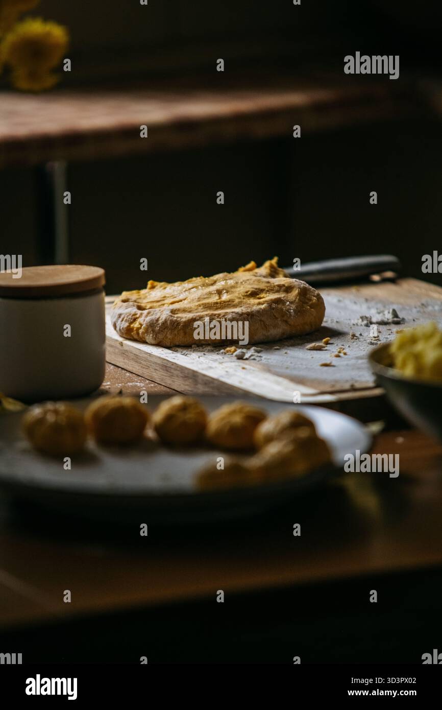Homemade dough resting on board Stock Photo - Alamy