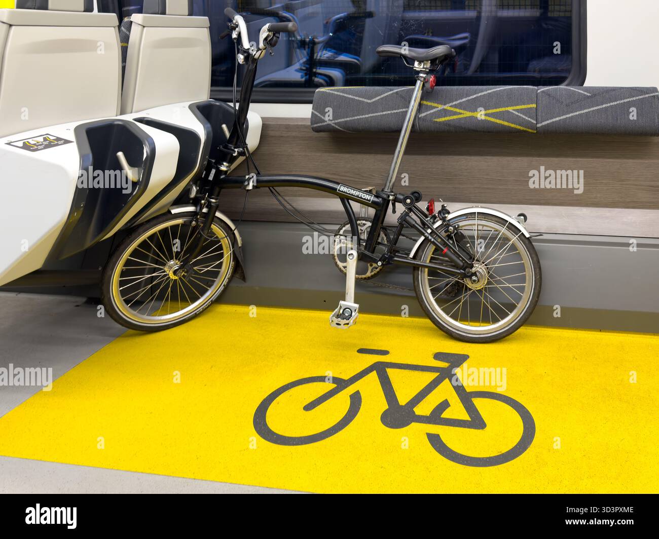 Cycle storage area with Brompton Cycle on Merseyrail class 777 Stadler ...