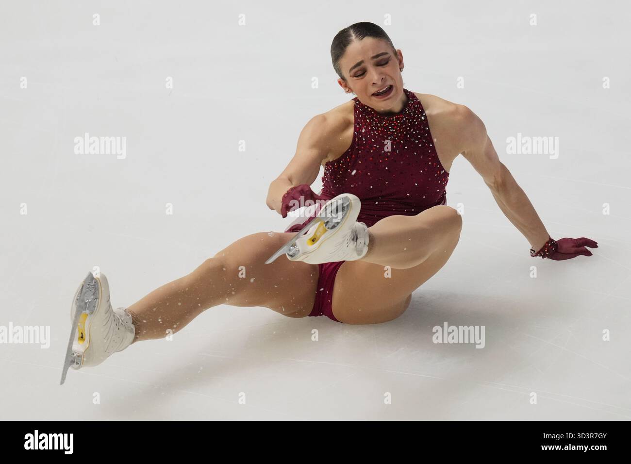 Anna Pezzetta of Italy falls during the women's short program in the ...