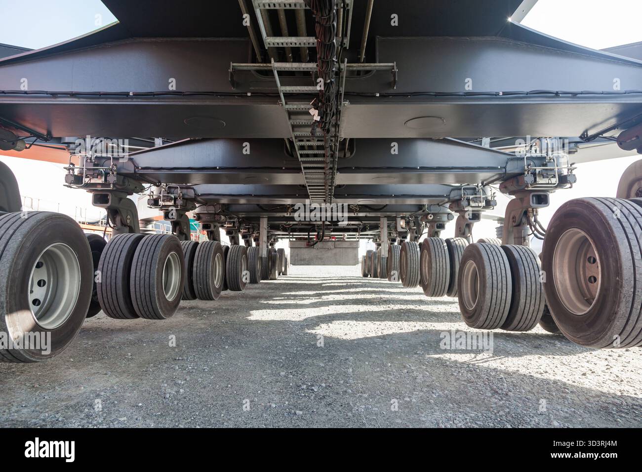 The chassis of a large truck crane. Wheelbase of the crane. Many wheels ...