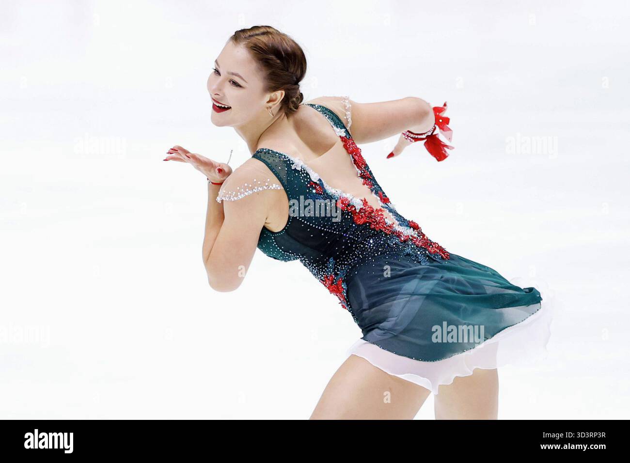 Sofia Samodelkina of Kazakhstan performs in the women's short program at the NHK Trophy figure ...