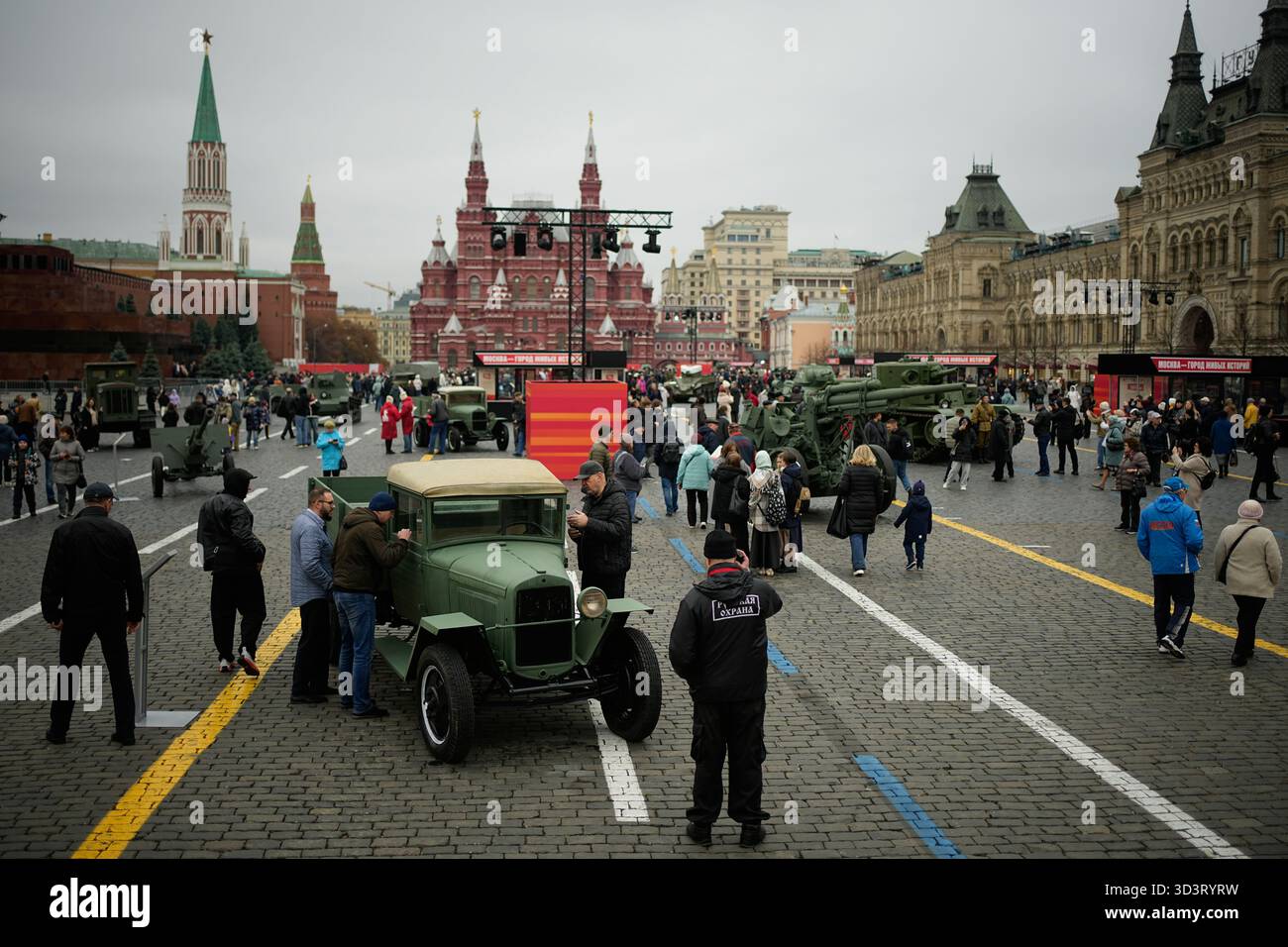 People attend an exhibit about a 1941 military parade on Red Square ...