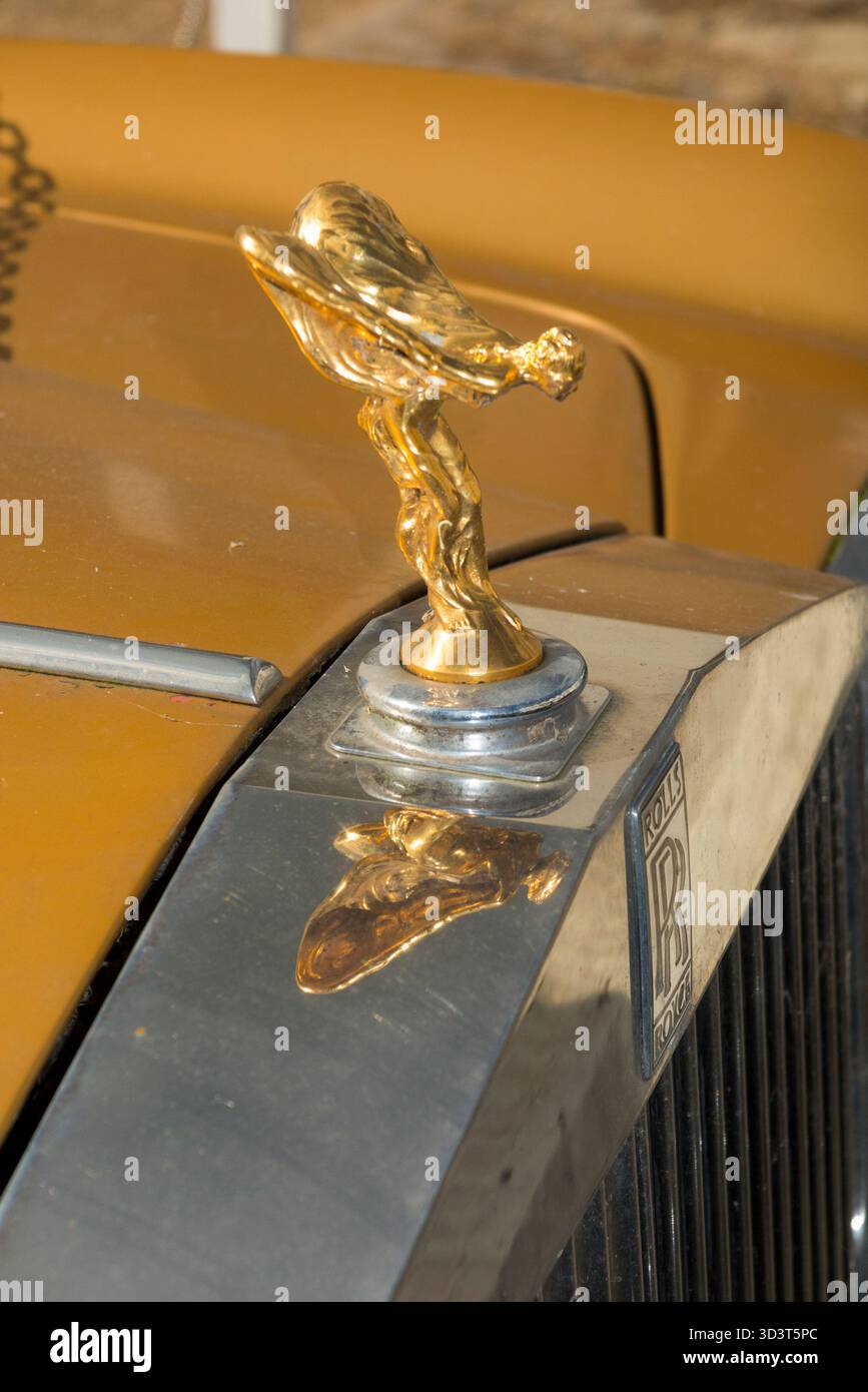 Spirit of Ecstasy bonnet mascot; gold female stauette figure on a ...