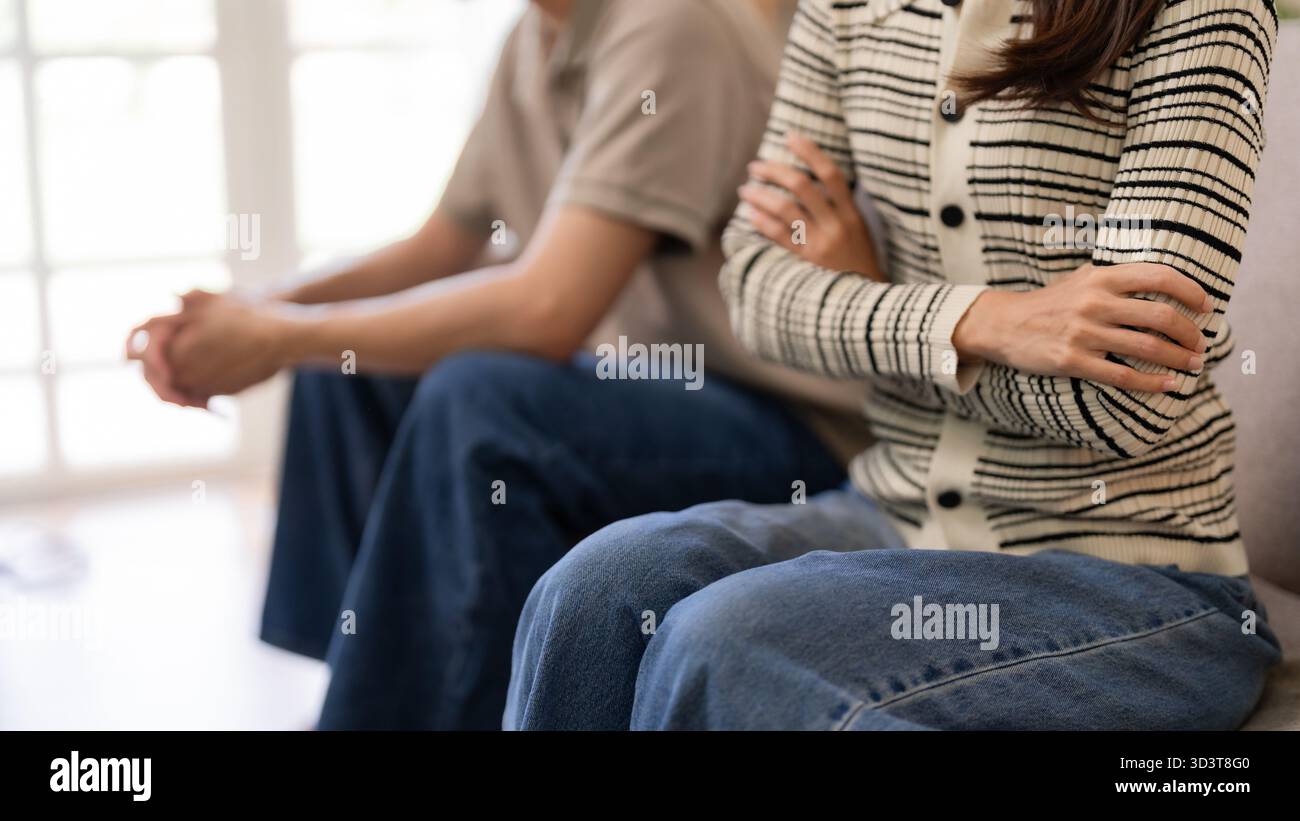 Couple experiencing emotional distress sitting hi-res stock photography ...