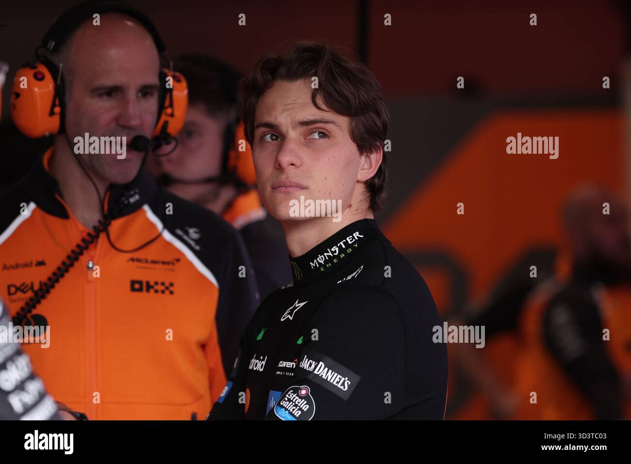 McLaren driver Oscar Piastri of Australia stands in the pit during a ...