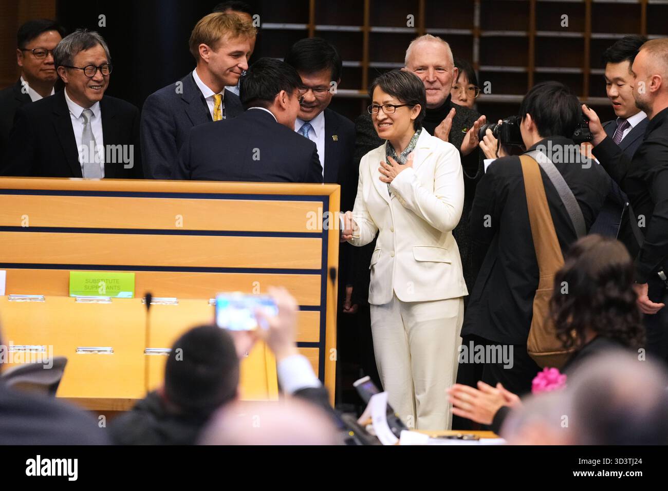 Taiwan's Vice President Bi-Khim Hsiao, center, is greeted as she ...