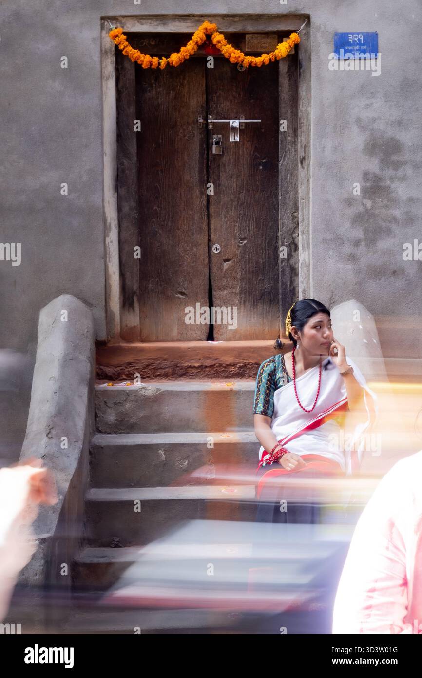 Nepali Newari Girl in Traditional Attire in Front of an Old House Door ...