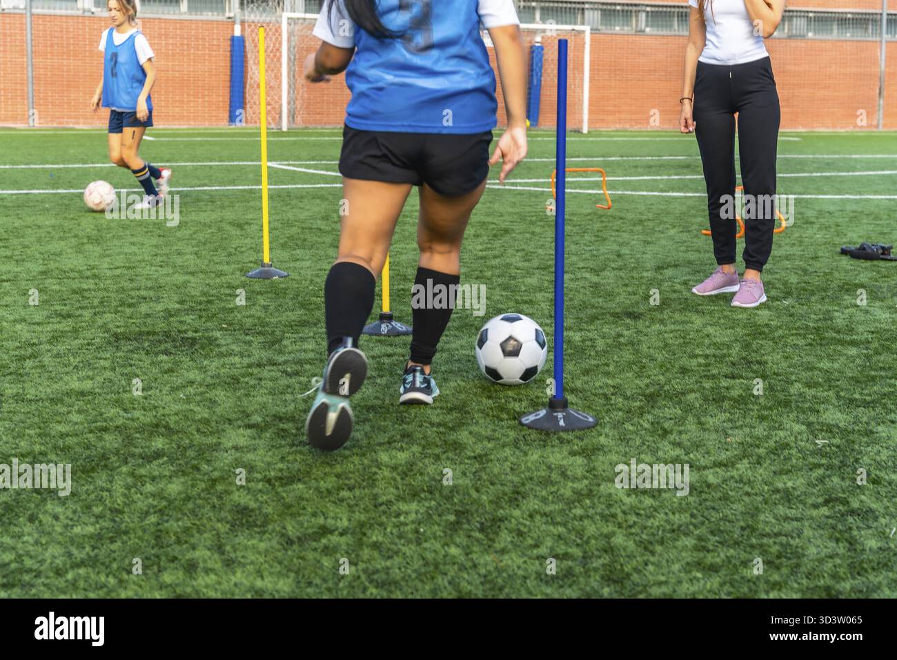 Women athletes practicing soccer hi-res stock photography and images ...