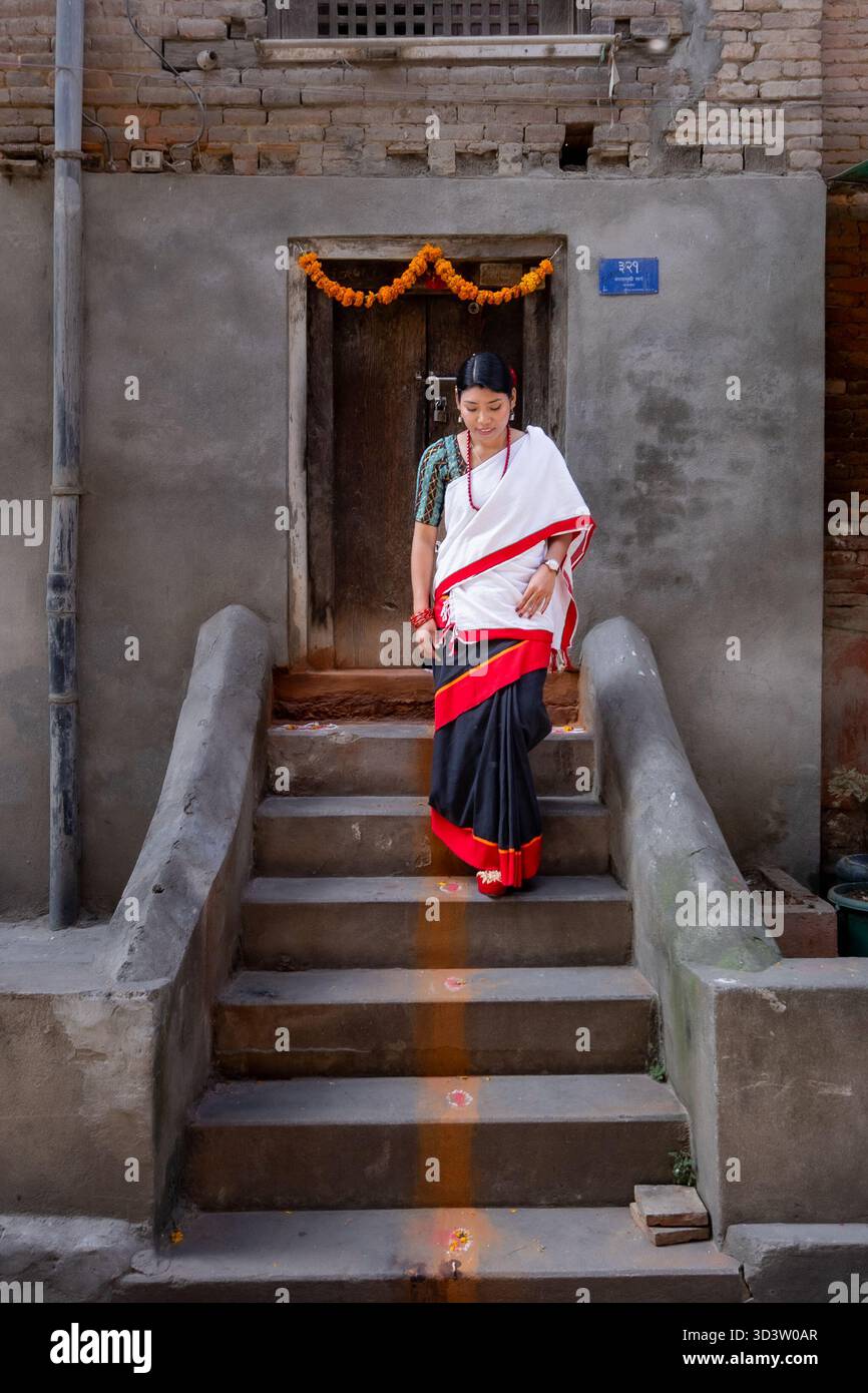 Nepali Newari Girl in Traditional Attire in Front of an Old House Door ...