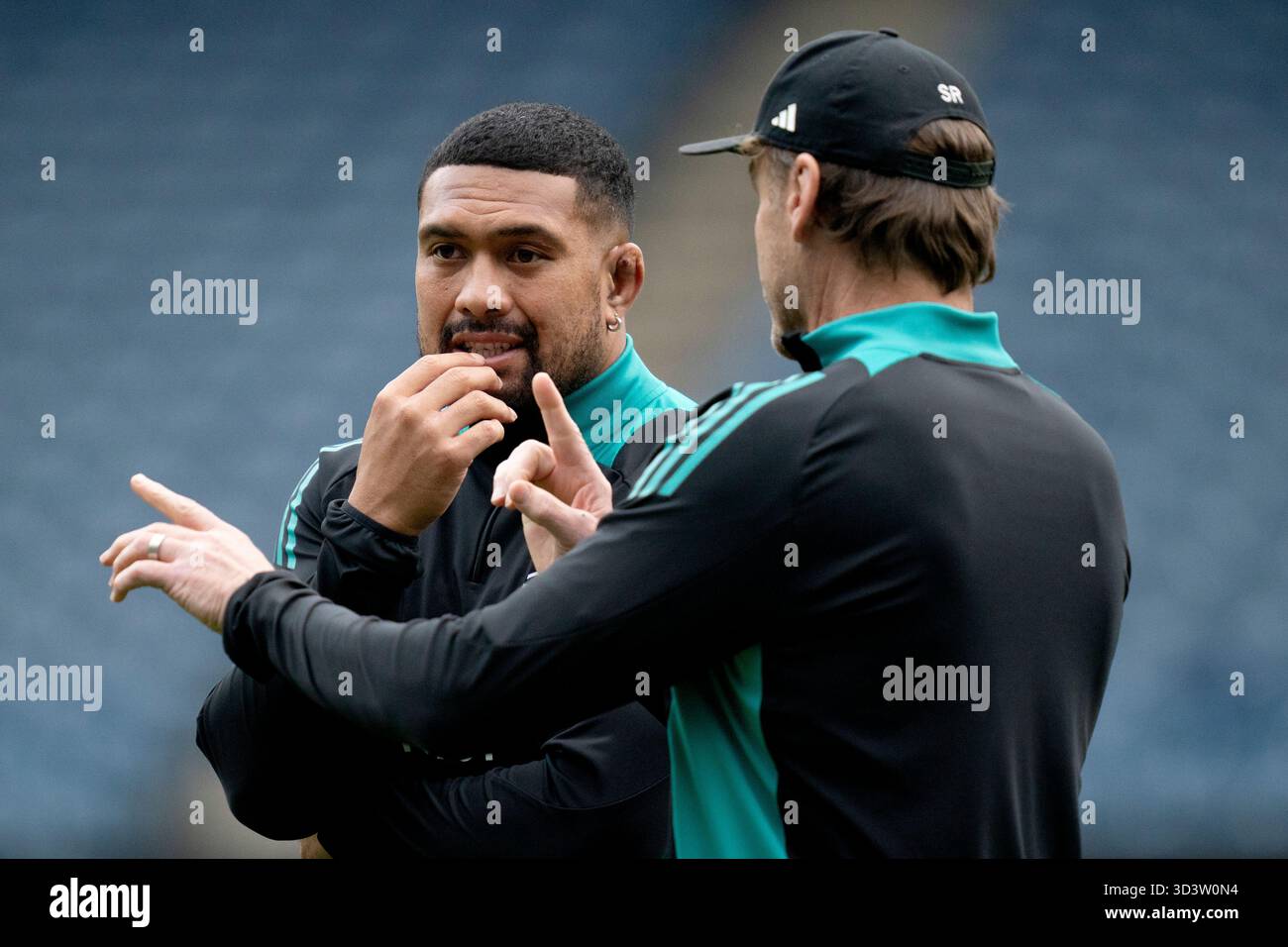 New Zealand's Ardie Savea (left) with head coach Scott Robertson during ...