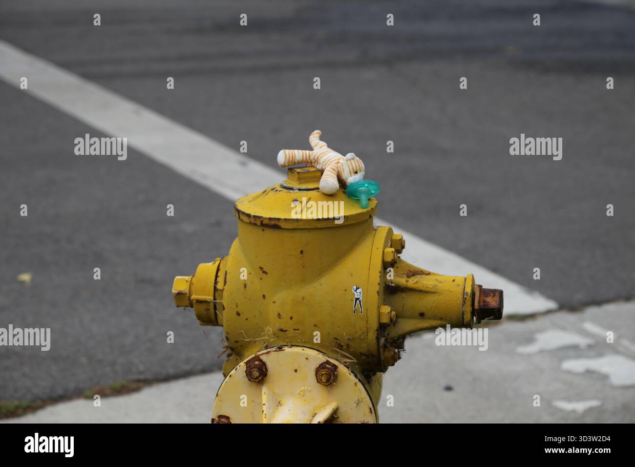 Toy on hydrant hi-res stock photography and images - Alamy