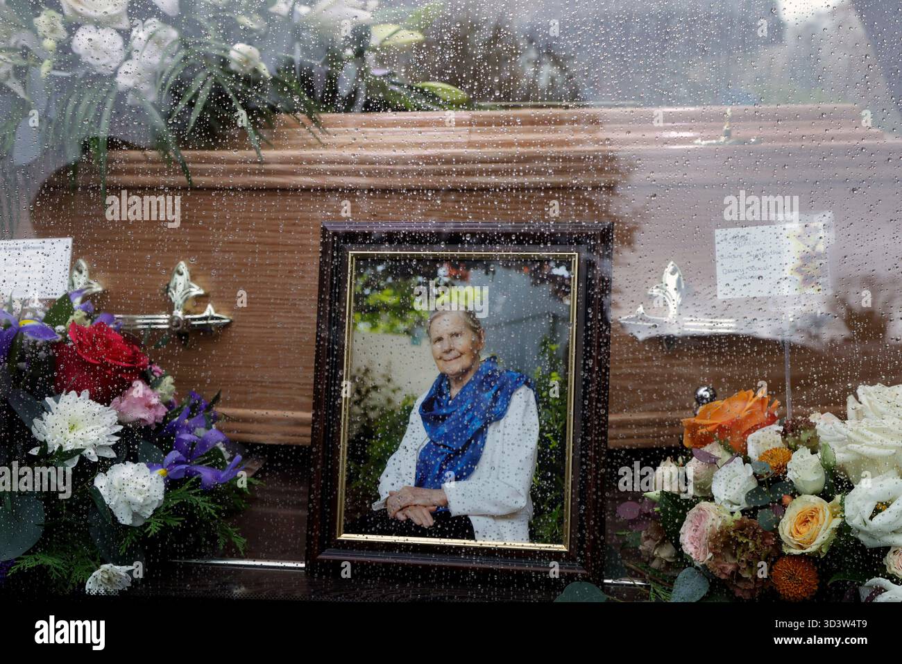 A photograph of Sr. Stanislaus Kennedy is seen in the hearse carrying ...