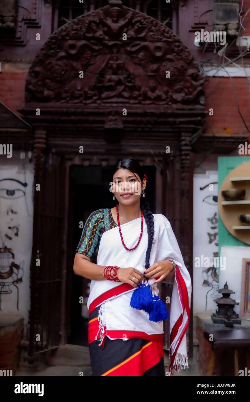 Nepali Newari Girl in Traditional Attire at the beautifully hand carved ...