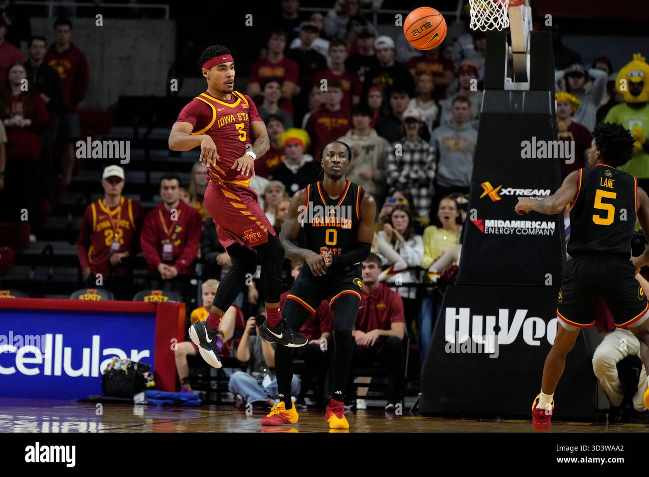 Iowa State guard Tamin Lipsey (3) passes over Grambling State guard ...