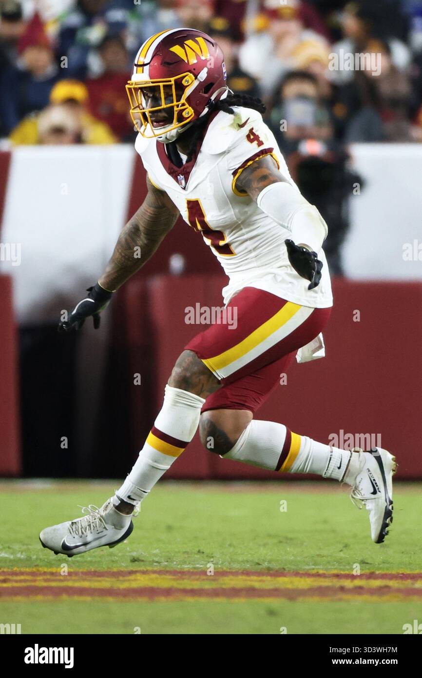 Washington Commanders linebacker Frankie Luvu (4) rushes during an NFL ...