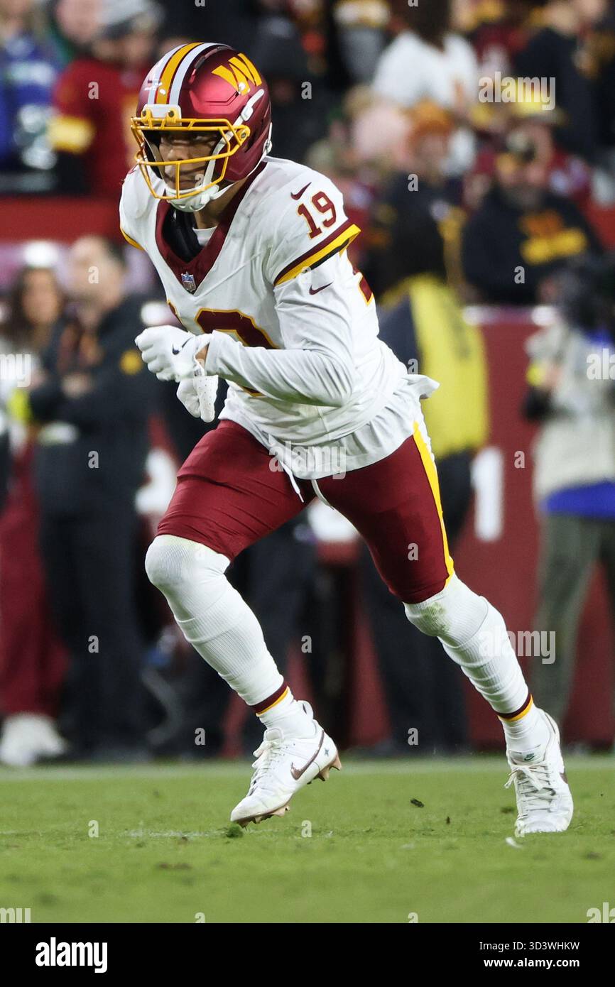 Washington Commanders wide receiver Chris Moore (19) runs a route ...