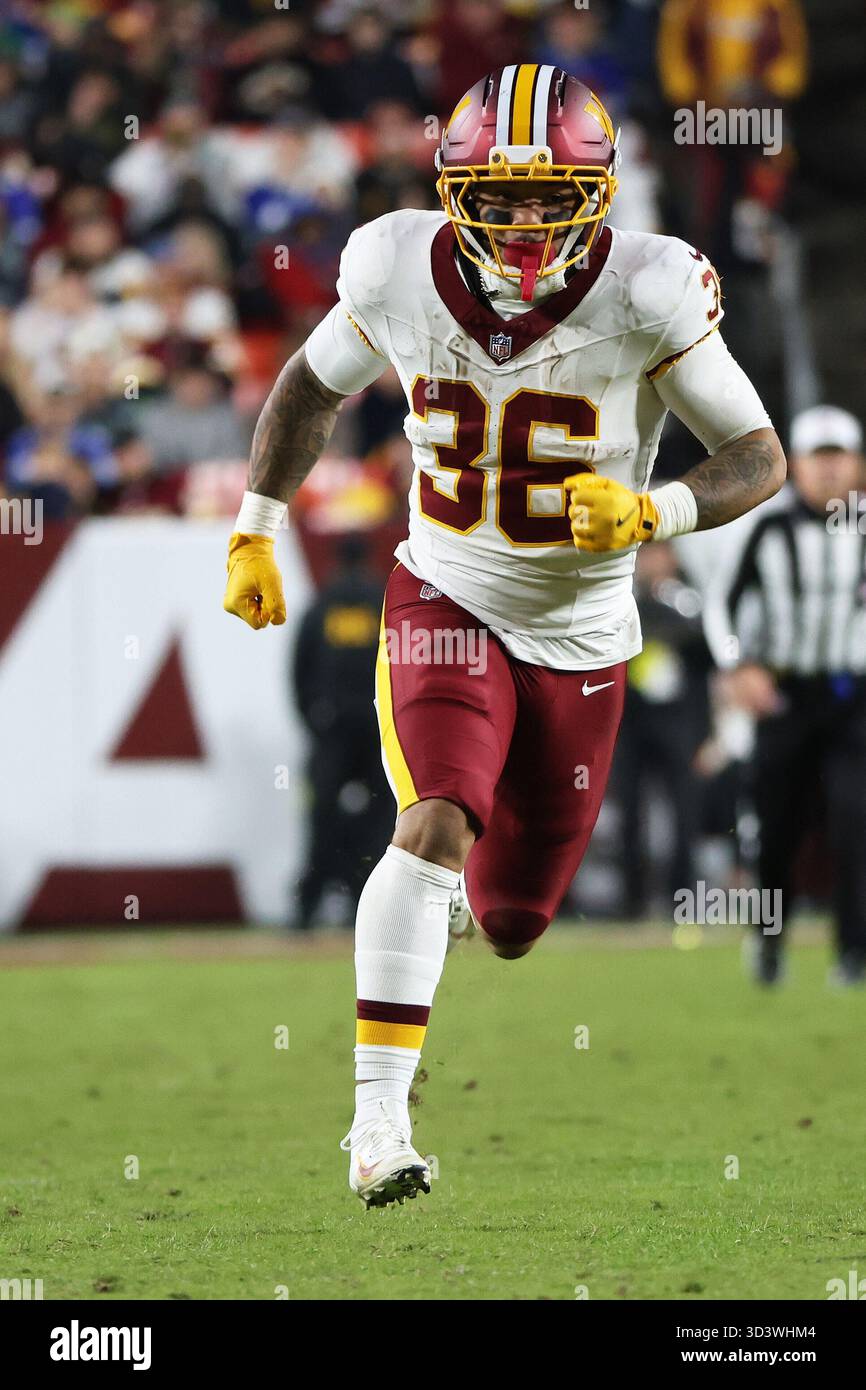Washington Commanders running back Chris Rodriguez Jr. (36) runs a ...