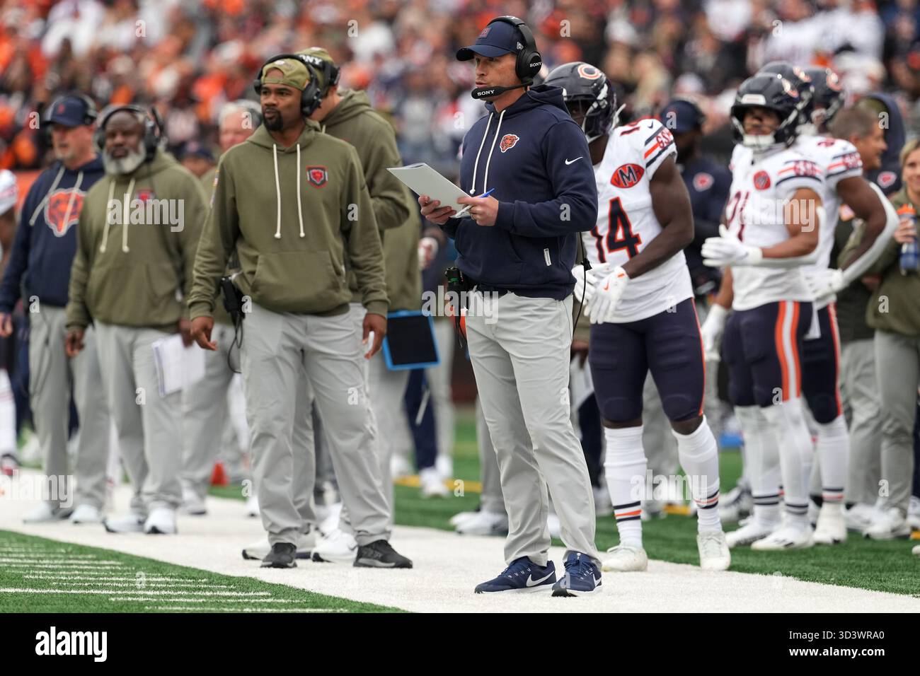 Chicago Bears head coach Ben Johnson watches play during an NFL football game against the ...