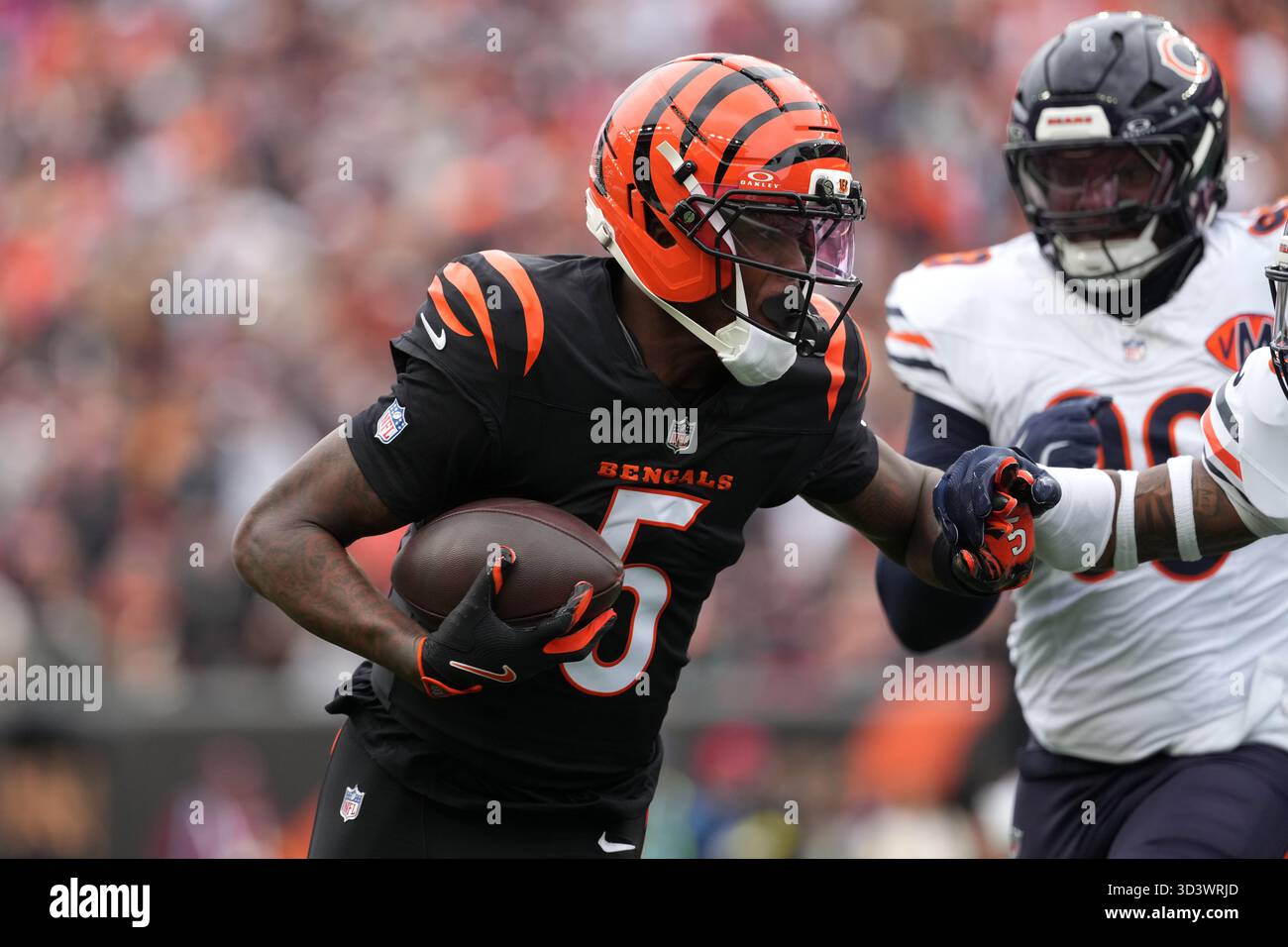 Cincinnati Bengals wide receiver Tee Higgins (5) runs downfield after ...