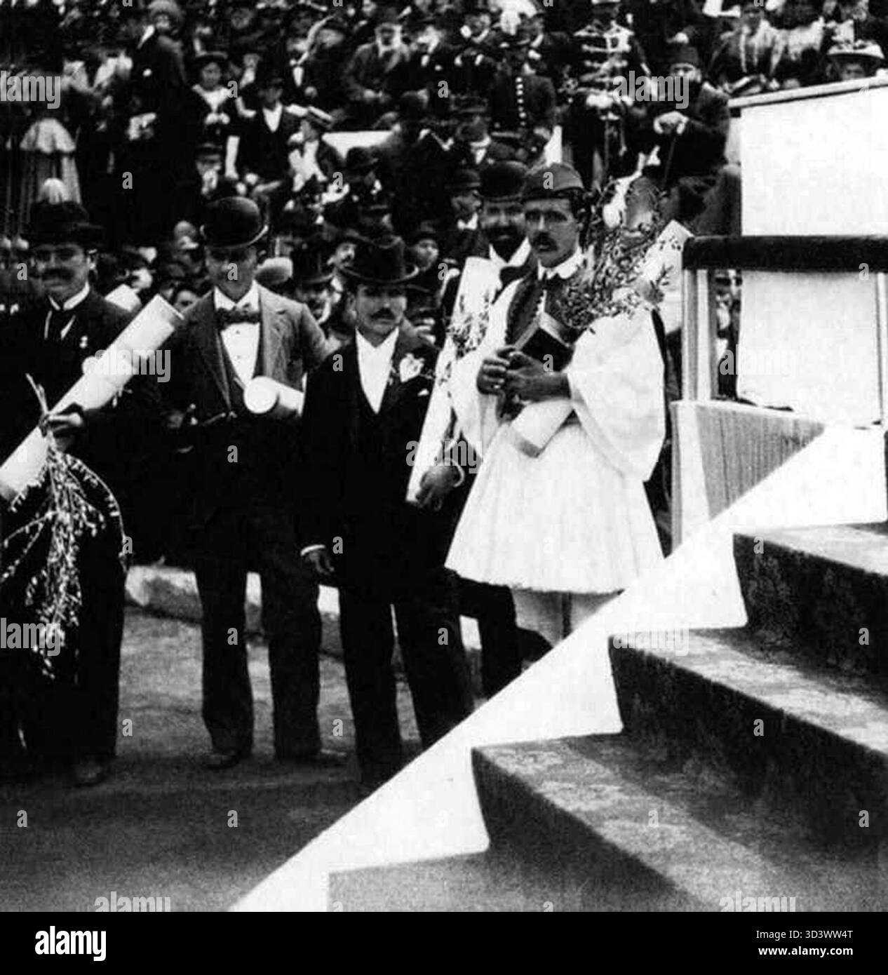 Spyridon Louis of Greece is seen receiving his victory medal after ...