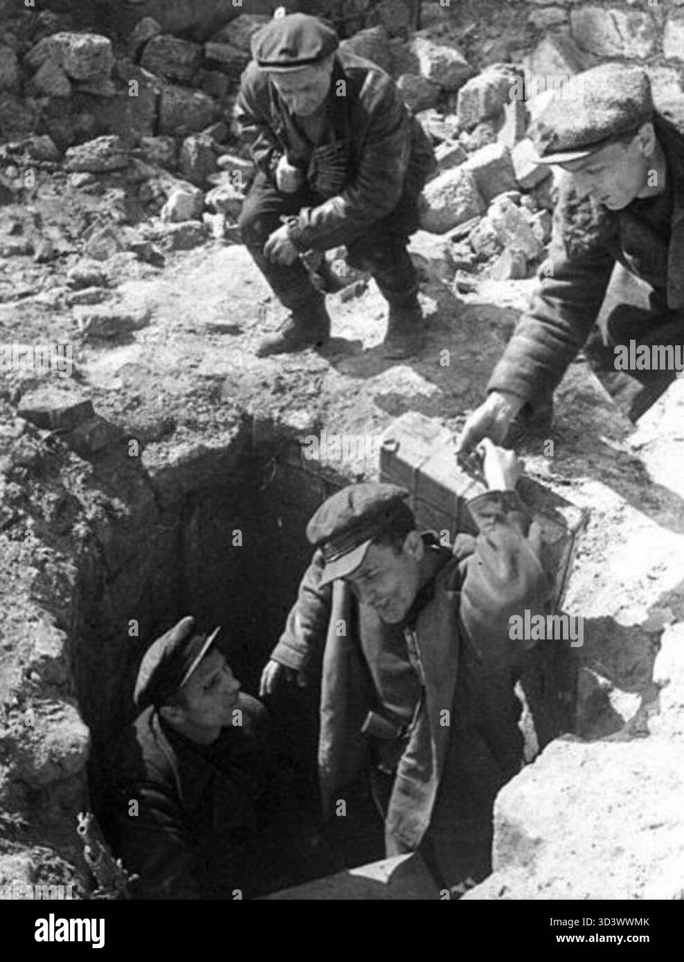 This photograph depicts partisans operating in the catacombs of Odessa ...
