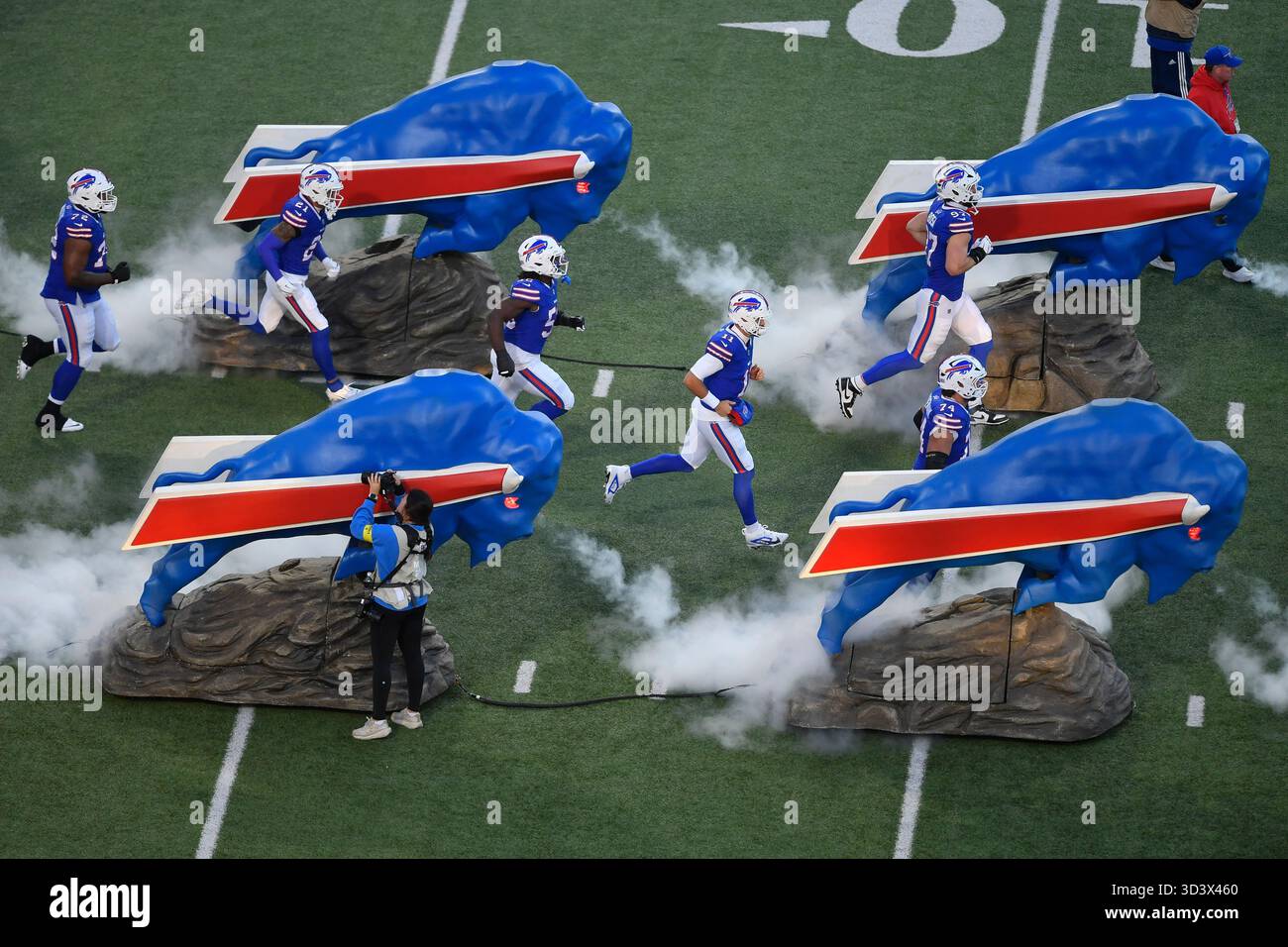 Buffalo Bills players run out for introductions before an NFL football ...