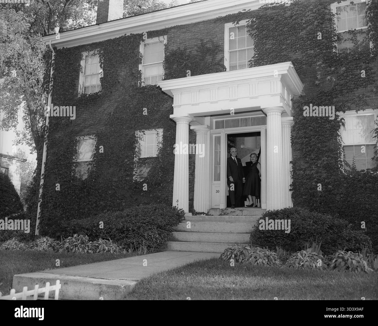 Dr. and Mrs. Gregory Pincus pose in front of their home in Northboro ...