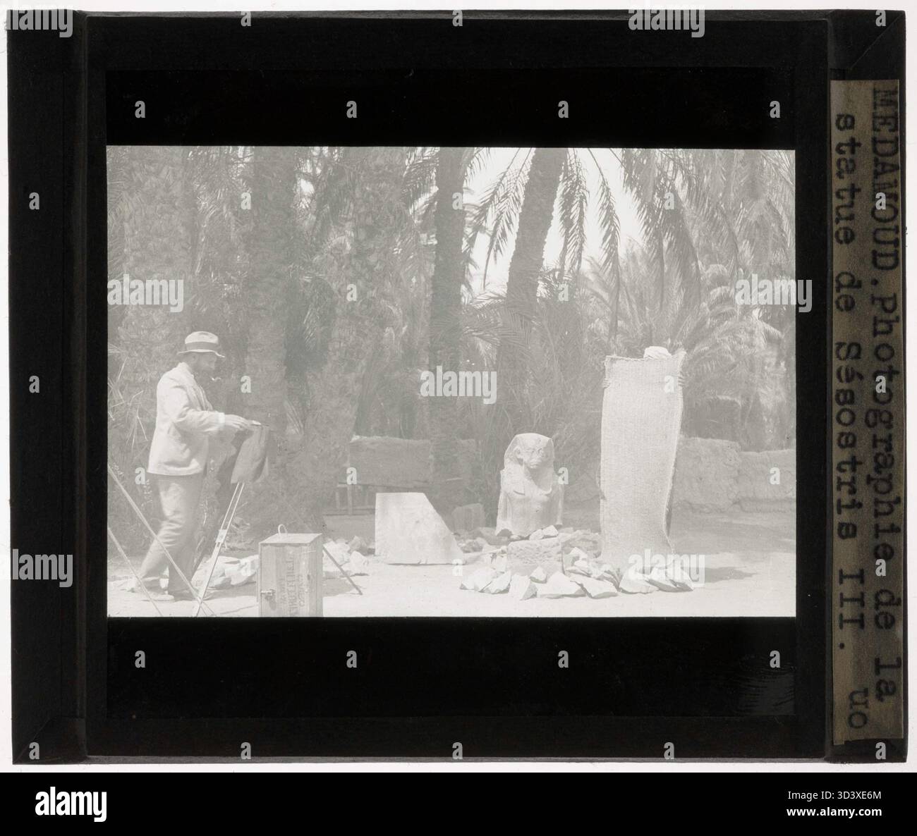 This 1924-1932 photograph shows a photographer capturing the statue of ...