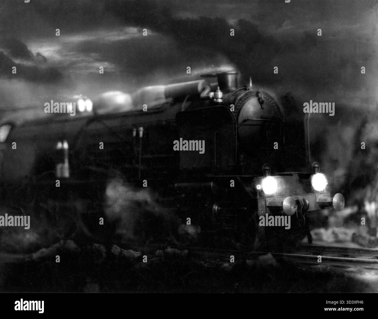 This image shows a steam locomotive operating in the dark, likely ...
