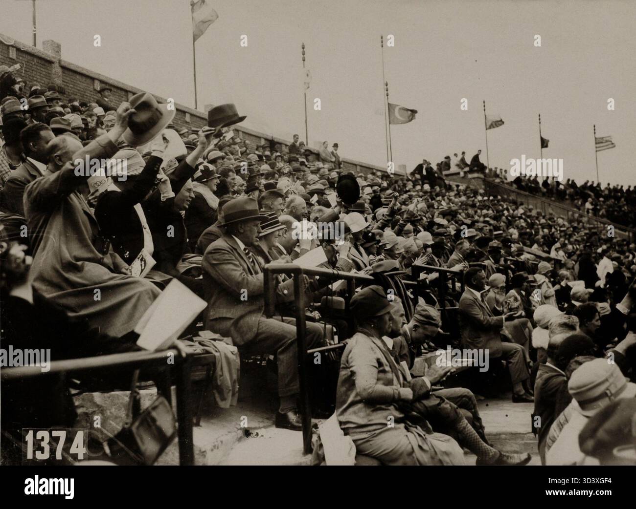 At the 1928 Olympic Games in Amsterdam, spectators are seated in the ...
