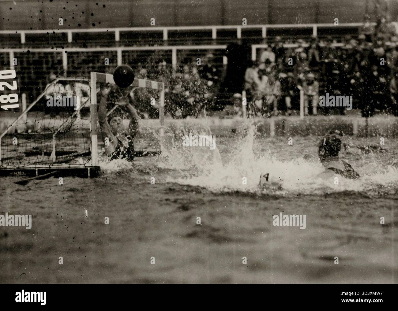 Water polo match during the 1928 Amsterdam Olympics. The image is a low ...